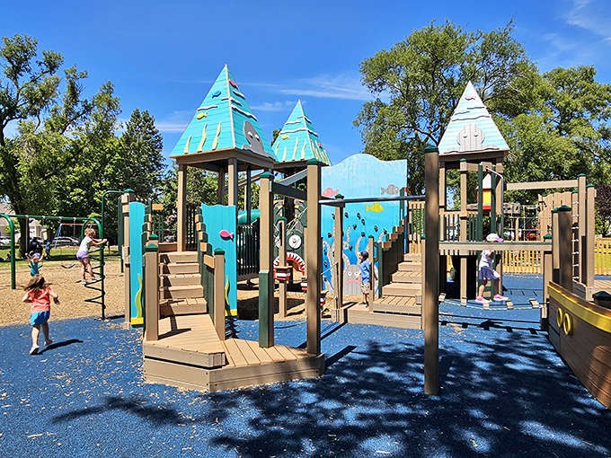 Kids' Corner playground where imagination runs wild and parents can actually sit down for five blessed minutes.