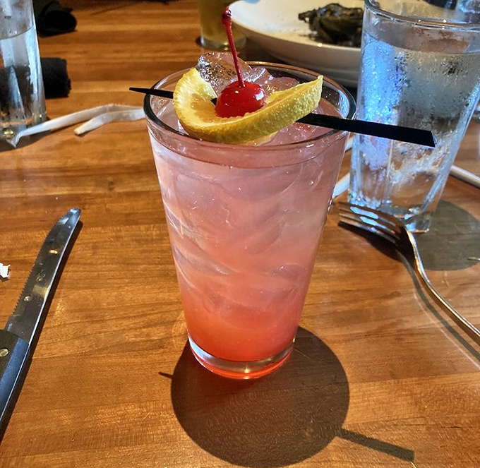 The Mai Tai arrives like a tropical vacation in glassware &ndash; garnished with citrus and cherry, it's Florida sunshine you can actually drink.