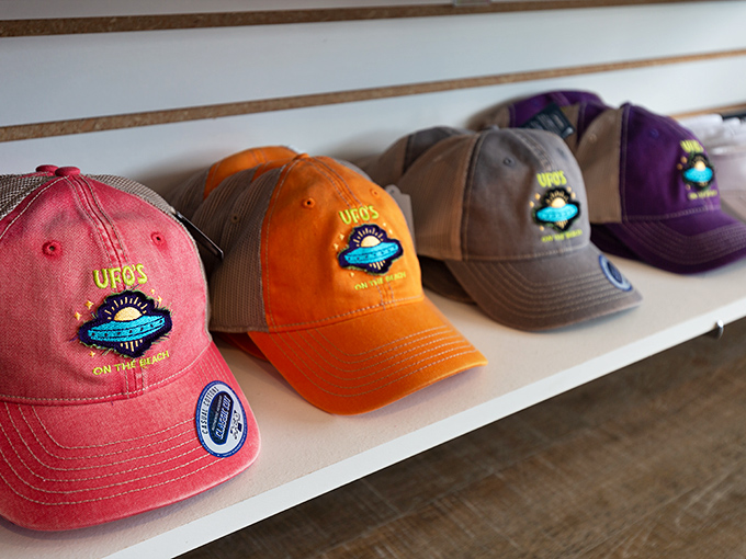 Merch: UFO's branded caps – the perfect souvenir for those who want to say "I believe" without actually having to explain themselves at work on Monday.