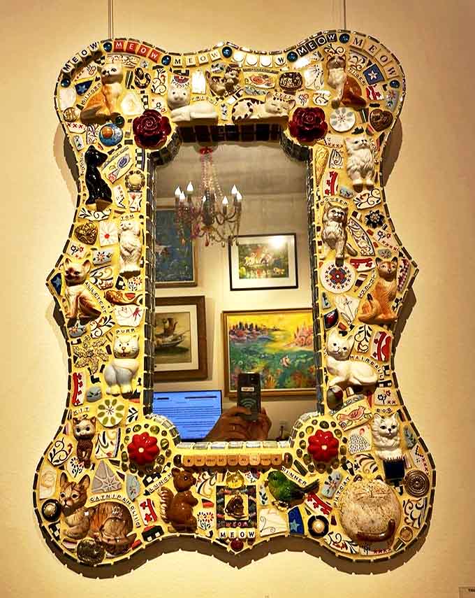 This mirror, framed with a dizzying array of trinkets and tiny treasures, transforms checking your reflection into a game of "I Spy"—created by someone who never met a knick-knack they didn't like.