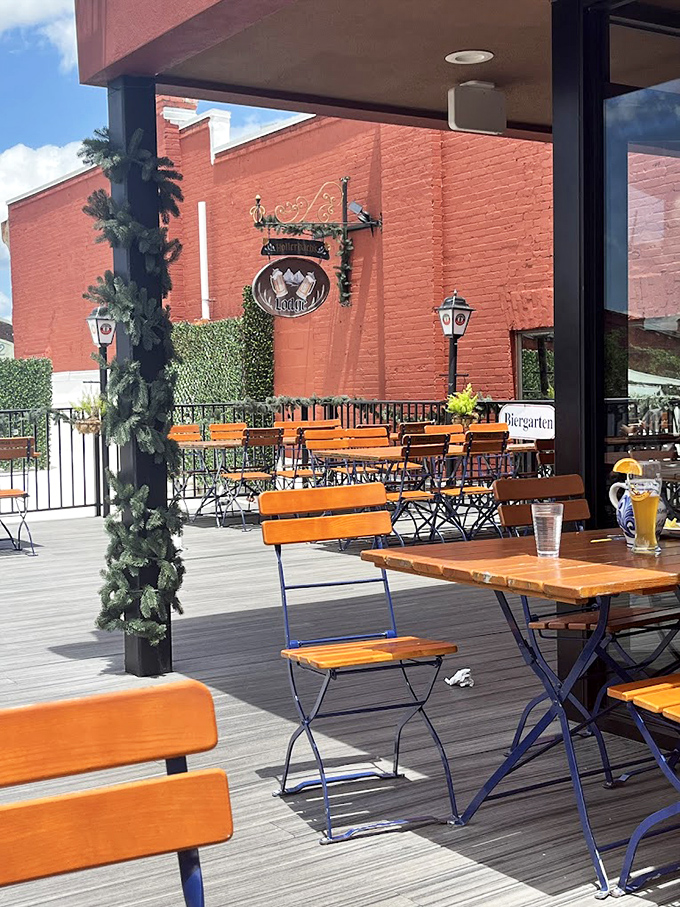 The biergarten at Hollerbach's – where Florida sunshine meets German hospitality. Those wooden chairs have heard many "Prost!" toasts.