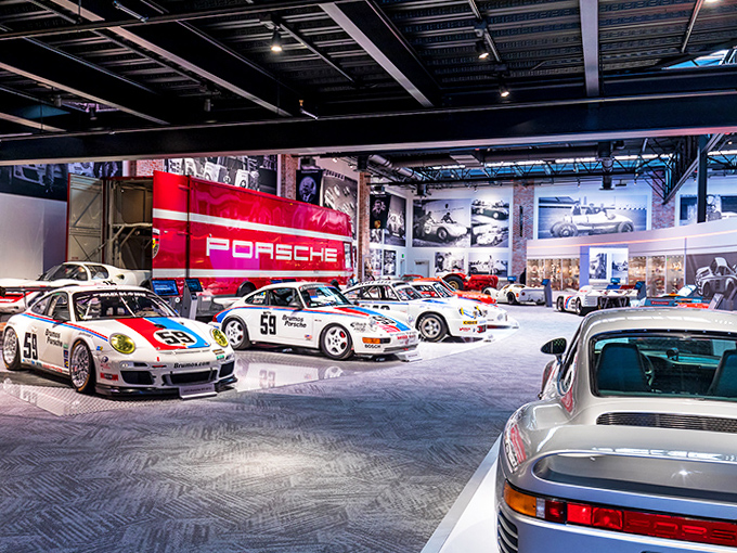 Multiple generations of Porsche racing excellence line up like a greatest hits album, each one representing a chapter in motorsports history worth celebrating.