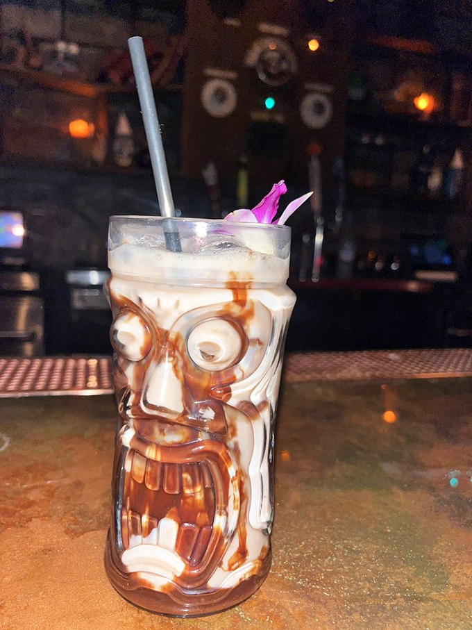 The "Screamin' Tiki" arrives in a glass that looks like it's actually screaming &ndash; making you wonder if your drink is more afraid of you than you are of it.