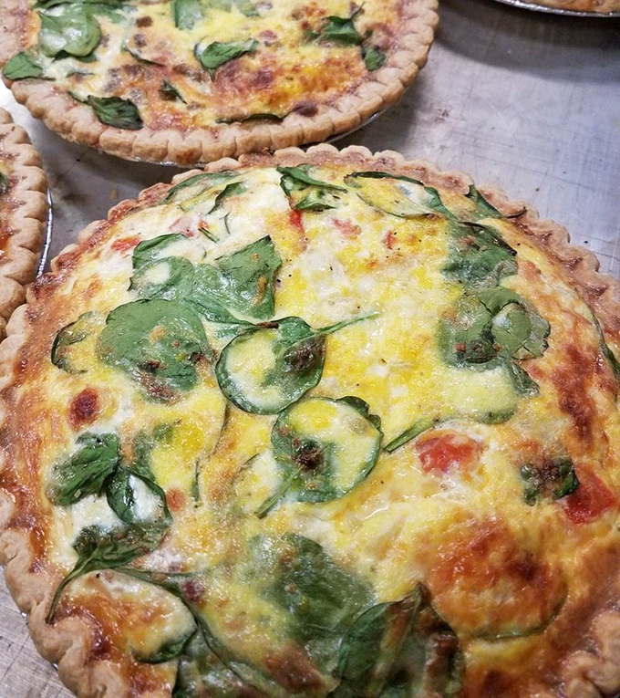 Spinach Quiche: The vegetable-containing alibi that lets you tell yourself "I had something healthy" while enjoying what's essentially a butter delivery system.