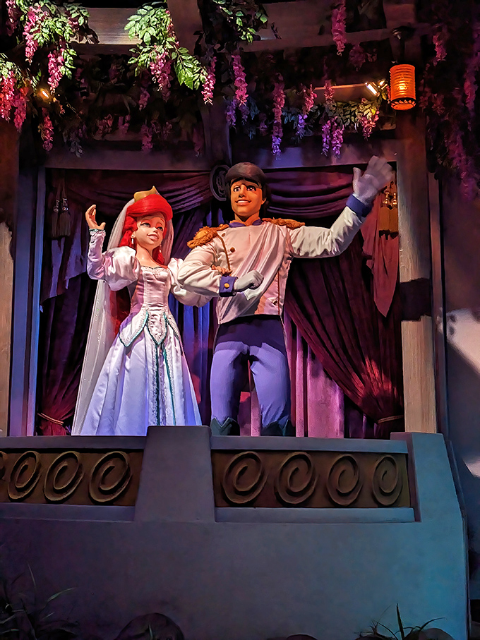 The Gaston fountain stands nearby, proving that even narcissists can make beautiful water features.