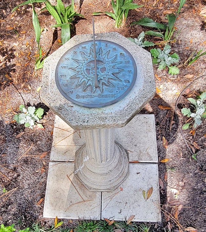 Time stands still at this ornate sundial, marking sunny hours in a garden where moments stretch languidly like the shadows of ancient oaks.