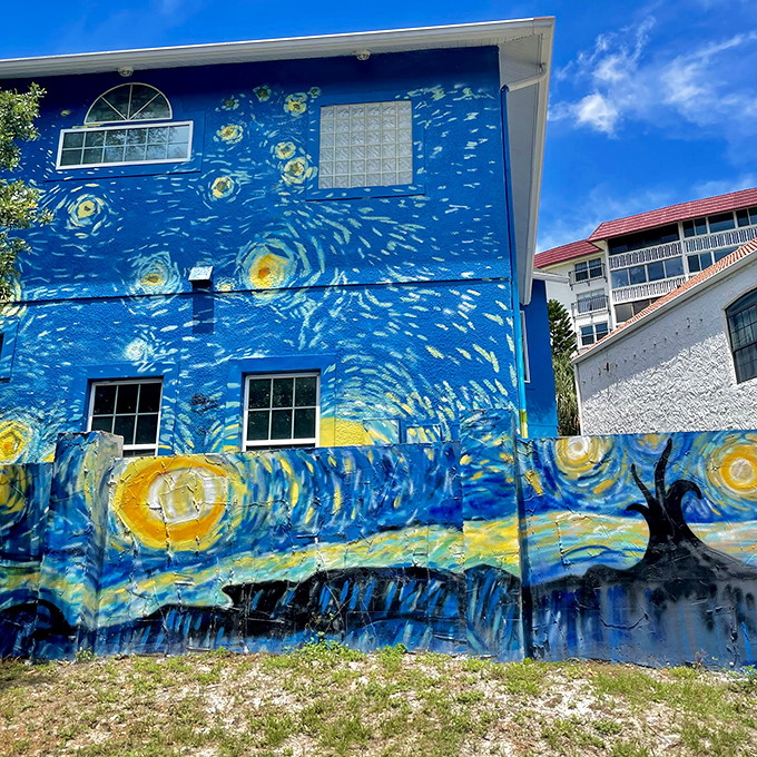 The signature swirling sky wraps around the second story, creating the illusion that the house itself might twirl away into the cosmos.