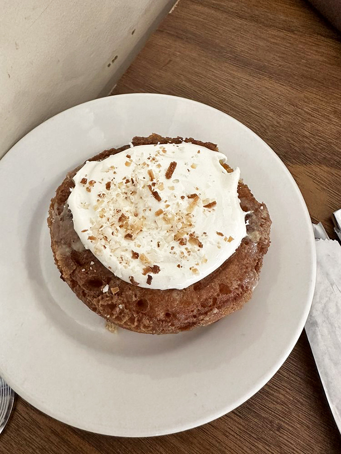 A sweet cloud topped with cream and cinnamon crumbles &ndash; proof that donuts can indeed be sophisticated affairs.