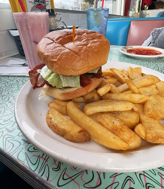A classic burger and fries that speaks the universal language of comfort food &ndash; juicy, substantial, and demanding both hands and several napkins.