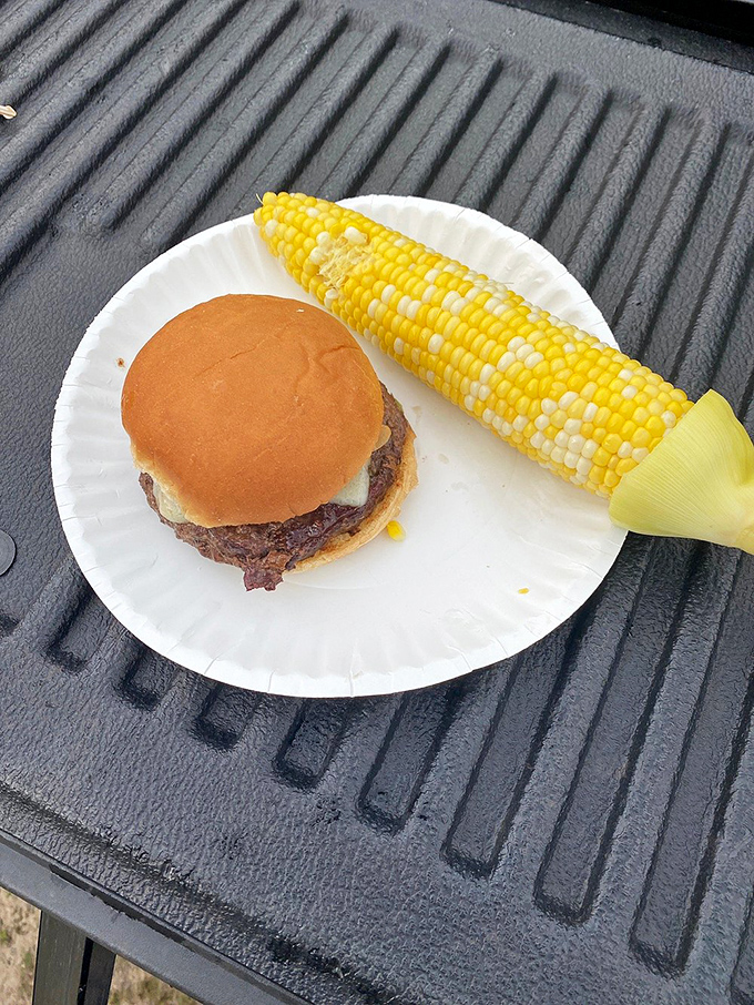 Simple ranch flavors shine with a juicy burger and sweet corn at Amber Elk Ranch in Ludington, Michigan today together.