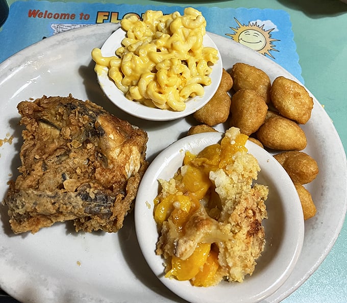 Southern comfort on a plate &ndash; fried chicken with that crackling skin, mac and cheese, and peach cobbler that tastes like summer memories.