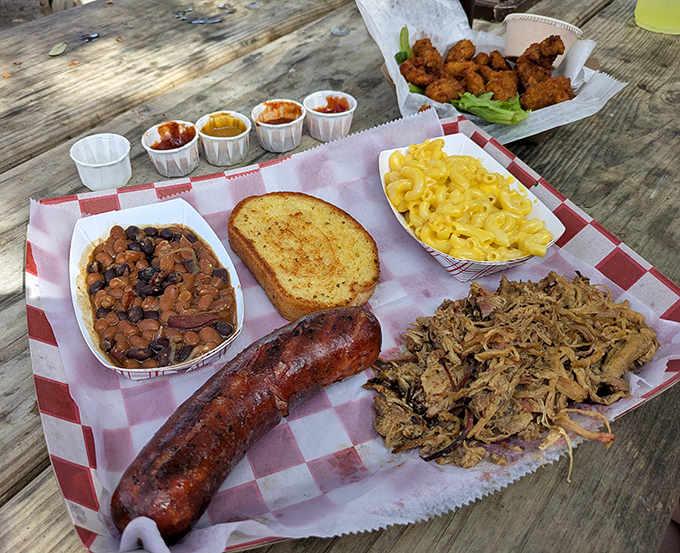 A feast for the senses &ndash; pulled pork, smoked sausage, and sides that would make any Southern grandmother proud.