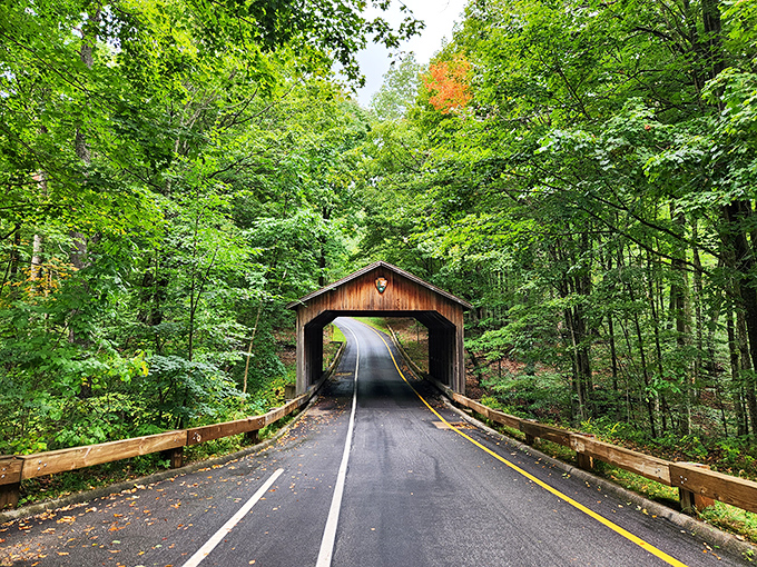 The iconic covered bridge entrance serves as a time portal &ndash; enter as a stressed traveler, exit as a nature enthusiast.