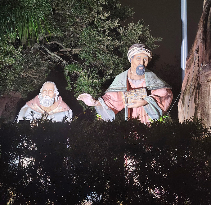 Night transforms the display into something magical&mdash;these illuminated figures seem almost alive, their shadows dancing across the landscape.