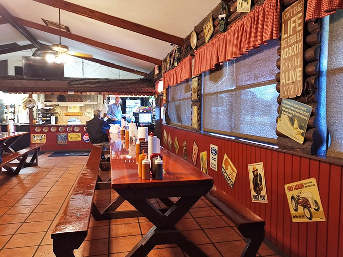 The dining room balances rustic charm with barbecue functionality&mdash;wooden benches, paper towel rolls at the ready, and that unmistakable aroma of hickory smoke.