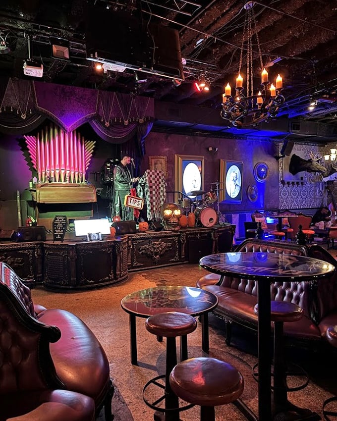 The interior combines Victorian elegance with horror-movie aesthetics, creating an atmosphere Tim Burton would approve of.