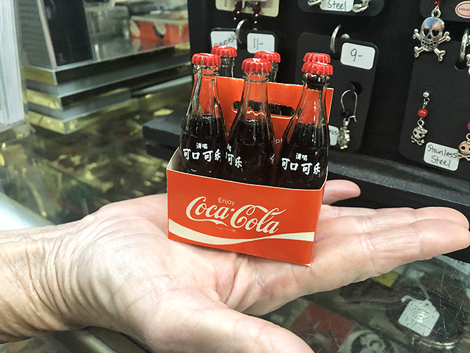 Tiny treasures pack big nostalgia, as these miniature Coca-Cola bottles prove good things come in small packages, especially for dedicated collectors.