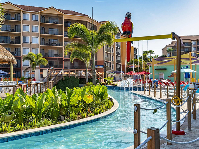 A vibrant parrot sculpture stands sentinel over the lazy river, adding a splash of tropical whimsy to this aquatic playground.