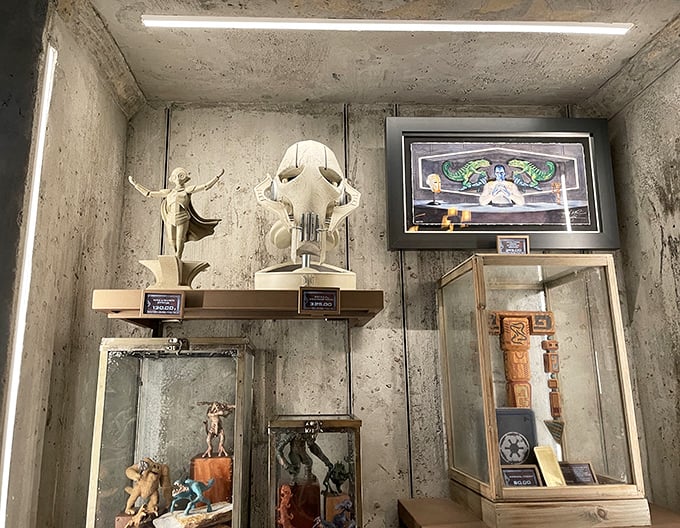 Rare collectibles and memorabilia line the walls, each item meticulously placed to create a museum-quality display of galactic history.