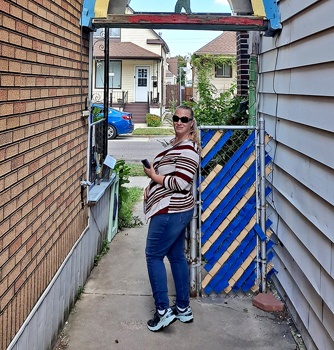 Visitors discover the joy of getting lost in someone else's imagination, navigating the narrow passages between ordinary homes and extraordinary art.