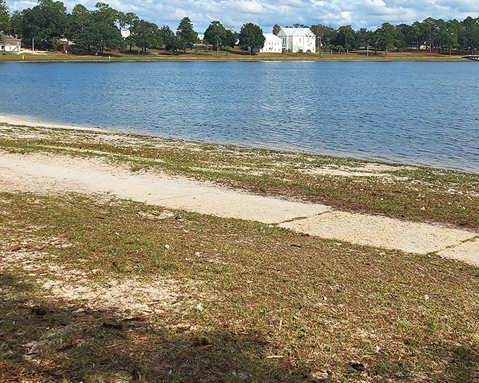 The shoreline's gentle curve embraces visitors with a simplicity that belies its geological uniqueness – no fancy beach umbrellas needed when you've got natural perfection.