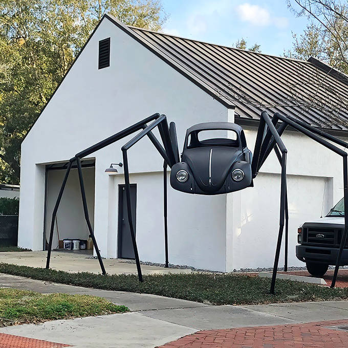 The VW Bug Spider combines vintage car culture with creepy-crawly creativity, hovering menacingly above curious onlookers.