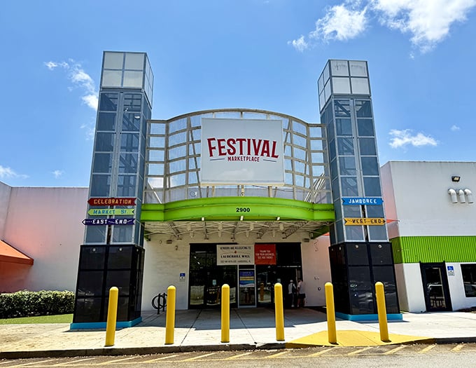 Modern marketplace magic! Festival's sleek towers and colorful directional signs create a shopping theme park where "Celebration" and "Jamboree" are actual destinations.
