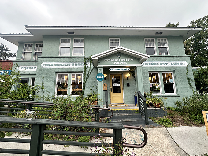This inviting entrance with climbing plants reflects the bakery's commitment to natural ingredients and community spirit.
