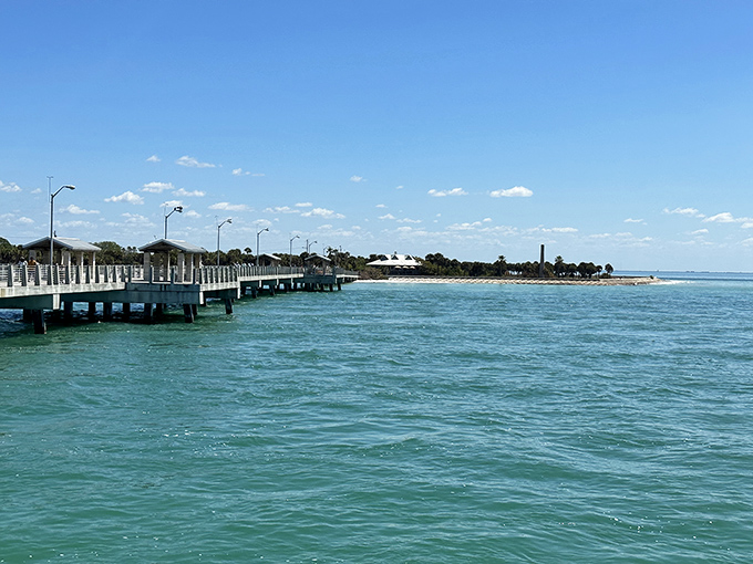 Fort De Soto's fishing pier extends into calm waters, offering both anglers and sunset-watchers the perfect perch.
