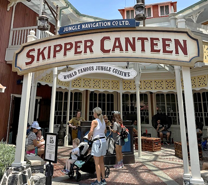 Skipper Canteen's charming colonial-style entrance welcomes adventurous eaters to this jungle-themed restaurant. The vintage signage sets the tone for the expedition-themed dining inside.