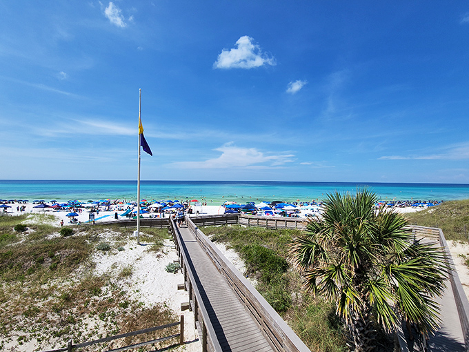 Another Angle: The boardwalk stretches toward the horizon, where the rhythm of waves provides nature's perfect soundtrack for relaxation.