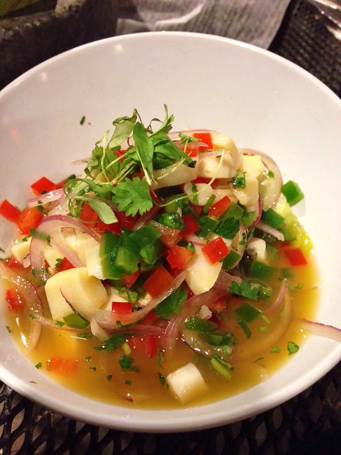 Bahamian conch ceviche dances with color and flavor &ndash; tender seafood "cooked" by citrus and brightened with peppers, onions and fresh herbs.