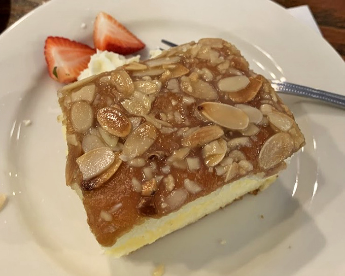 Bienenstich (Bee Sting Cake) – honey-almond topping over vanilla custard filling. Calories don't count when they're this delicious!