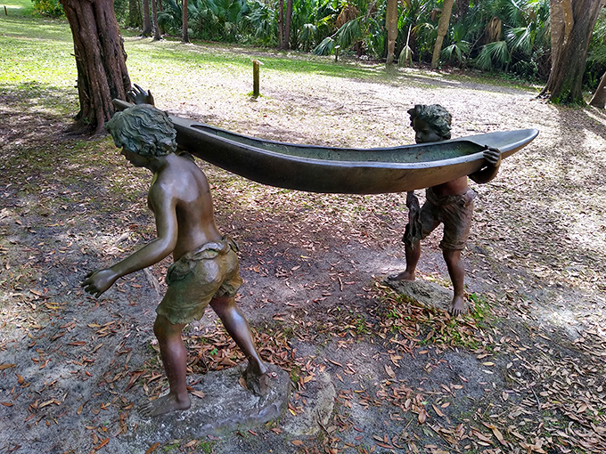 Bronze figures carry their eternal burden with grace, this sculptural element adding classical charm to Eden Gardens' already enchanting landscape.