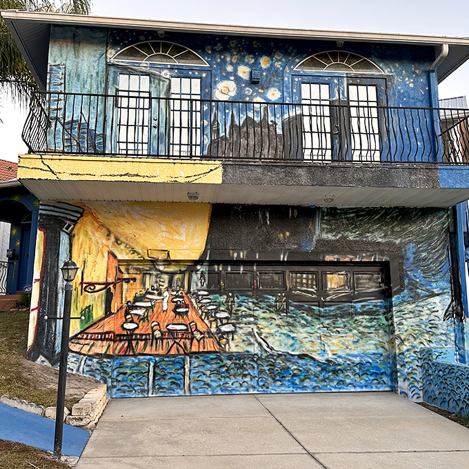 The garage door cleverly incorporates van Gogh's "Caf&eacute; Terrace at Night," transforming a mundane feature into another canvas for artistic expression.