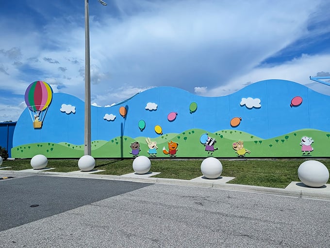 The character balloon wall mural captures Peppa's whimsical world – where familiar friends from the show create a colorful backdrop for family photos.