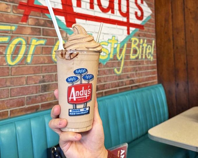 This isn't just a chocolate shake&mdash;it's a masterpiece in a branded cup. The logo reminds you where you are, as if the flavor explosion wasn't memorable enough.