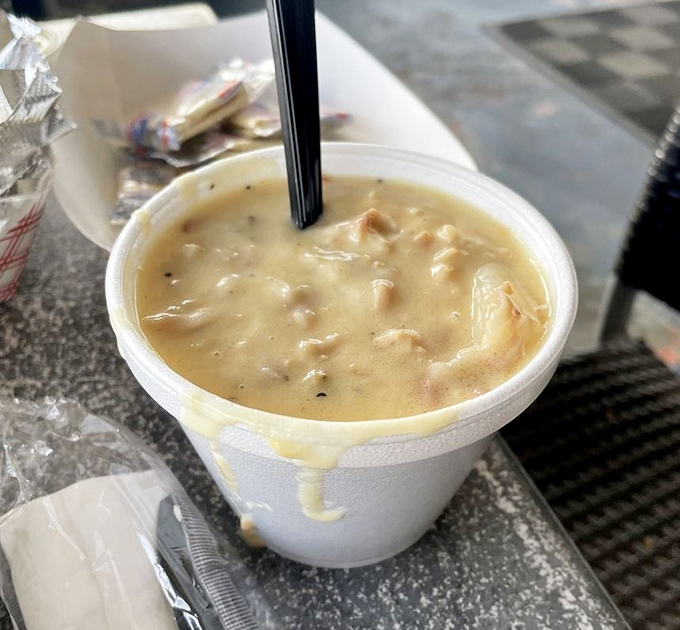 A creamy ocean hug in a cup, studded with tender clams and potatoes &ndash; comfort food with a maritime passport.