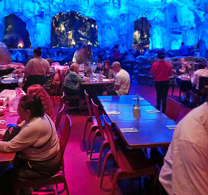 Diners enjoy their prehistoric feast under the cool blue glow of ice cave lighting &ndash; dinner with atmosphere cranked to eleven.