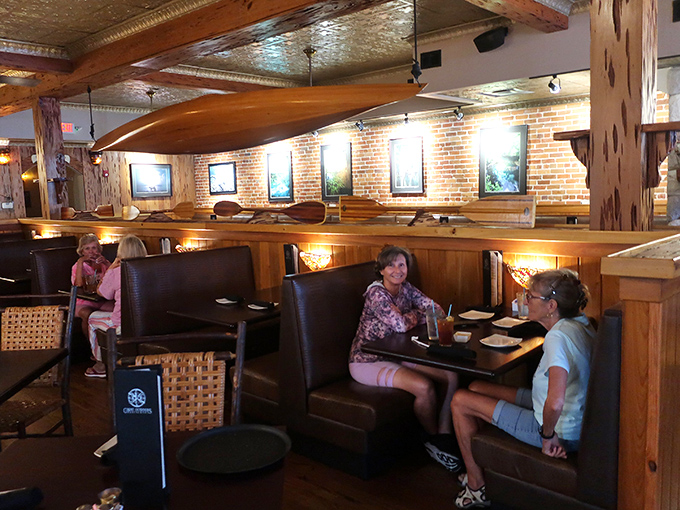 The dining room buzzes with conversation and laughter, each table creating memories around plates of Southern-inspired comfort food.