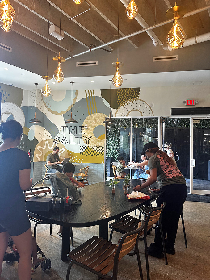 Diners: Where coffee conversations flow as freely as the cold brew &ndash; community happens naturally around these shared tables.