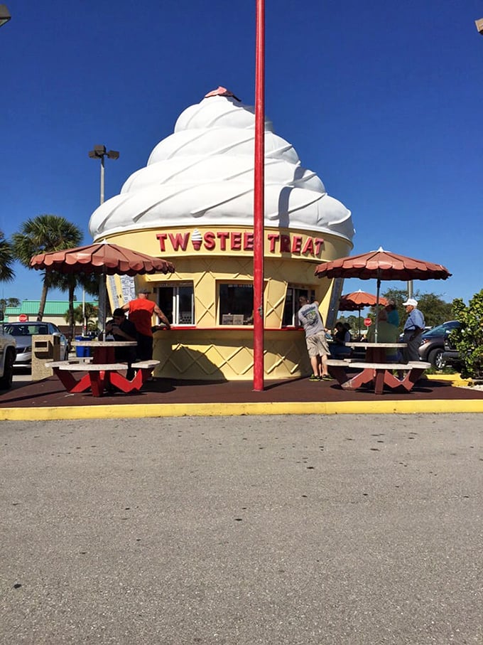 Happy customers gather at Twistee Treat's outdoor seating area, where strangers become friends united by the universal challenge of eating ice cream before it melts.