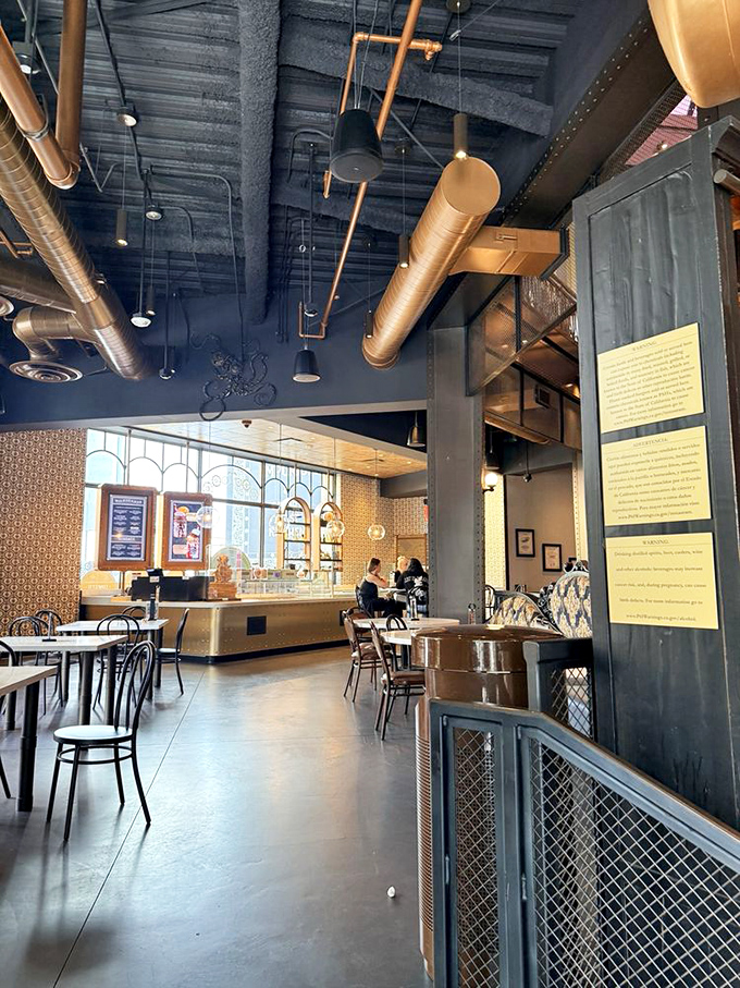 Industrial chic meets sweet retreat &ndash; copper pipes overhead while you contemplate which dessert to devour first.