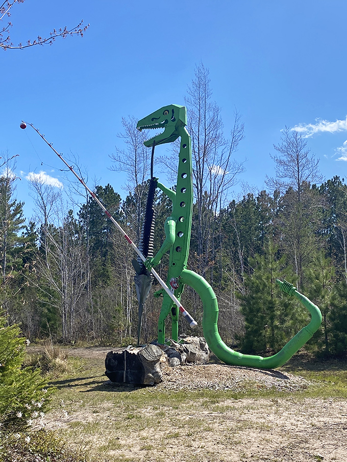 A prehistoric predator goes fishing! This green dinosaur sculpture showcases the playful imagination behind Lakenenland's most beloved installations.