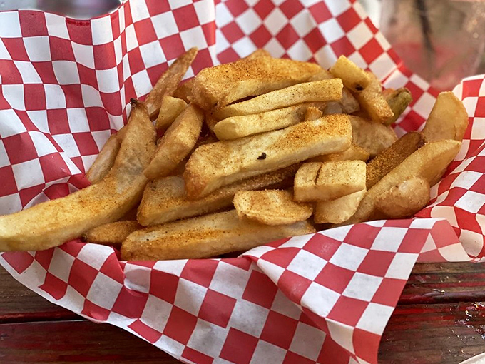 These aren't just fries &ndash; they're golden potato wands dusted with secret seasoning that makes ketchup entirely optional but still welcome.