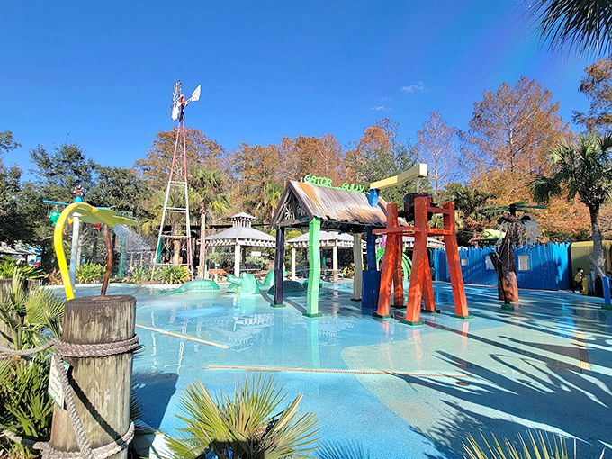 Colorful sprayers and fountains offer welcome relief from Florida's heat, proving even reptile-themed parks understand the importance of cooling off.