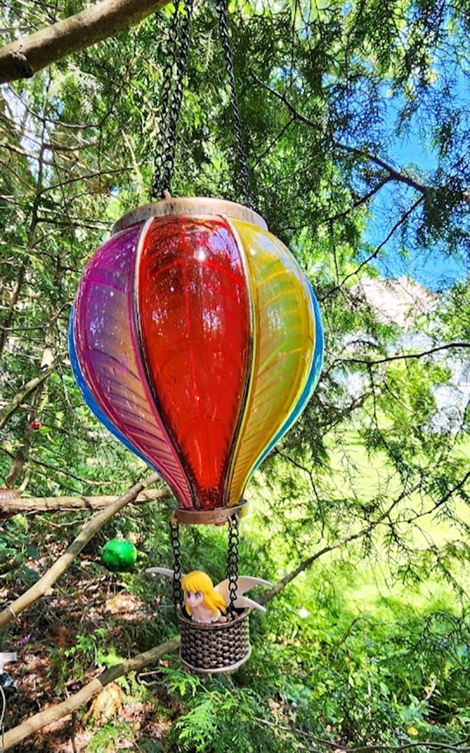 Hanging Rainbow Balloon Ornament: A kaleidoscope of colors suspended mid-air - fairy transportation that puts hot air balloon festivals to shame.