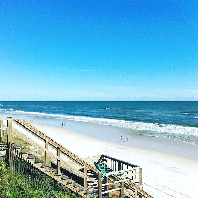 Beach access with a view: These wooden steps aren't just functional&mdash;they're the prologue to countless vacation stories waiting to unfold on the shores below.