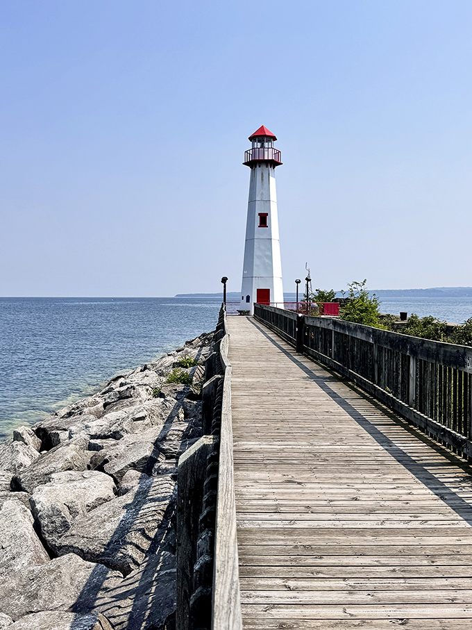 The lighthouse beckons at the end of this sun-drenched boardwalk – Michigan's version of the yellow brick road, just with better views.