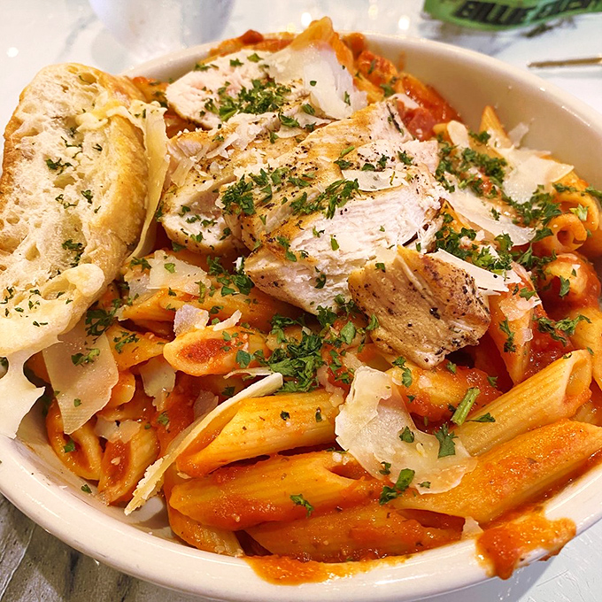 Pasta perfection with chicken and marinara &ndash; because even in dessert paradise, sometimes you need actual sustenance.